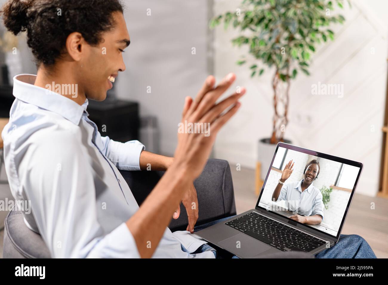 Virtual meeting, video call concept. Cheerful multiracial man in casual ...