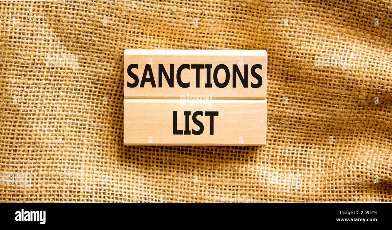Sanctions list symbol. Wooden blocks with concept words Sanctions list ...