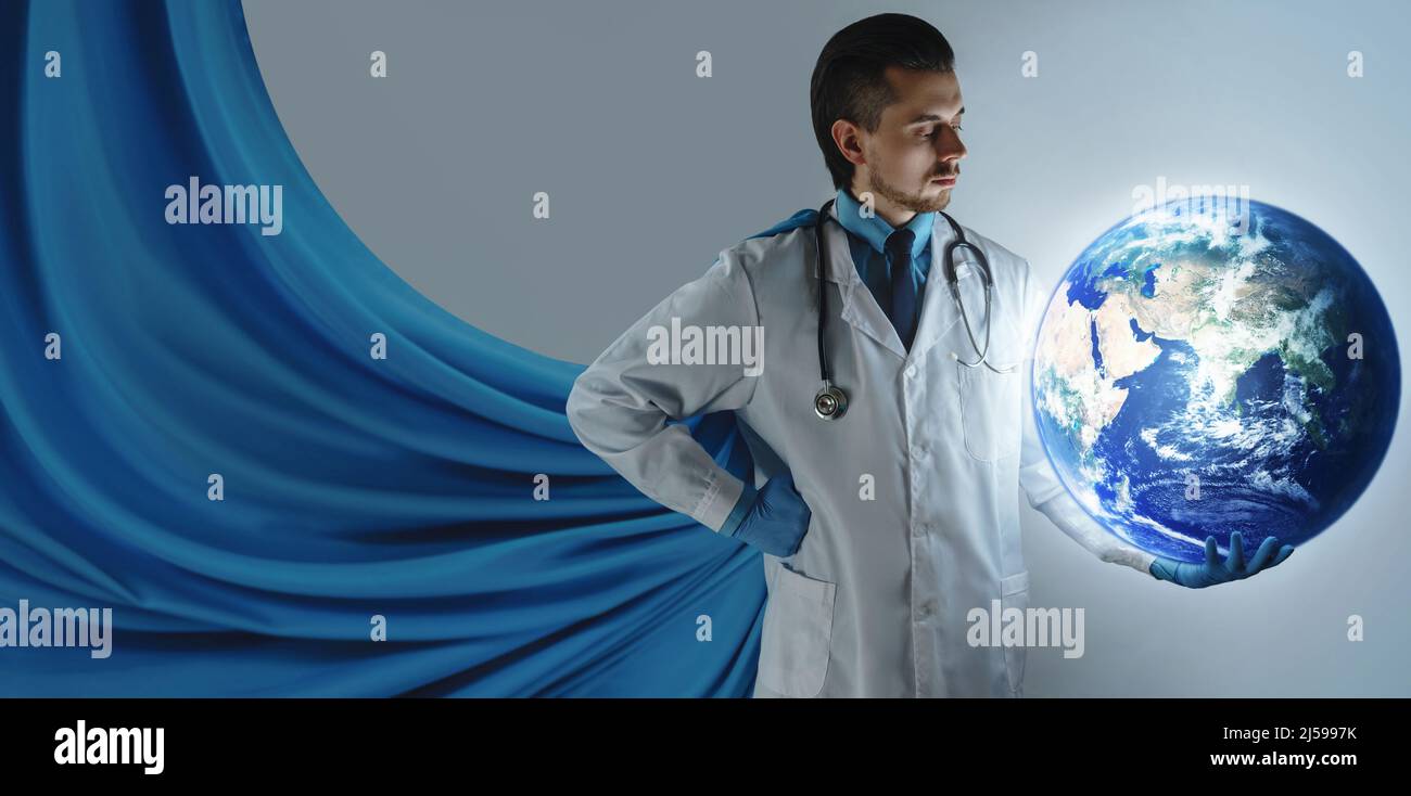 Brave doctor superhero with blue cape holding planet earth in his hand ...