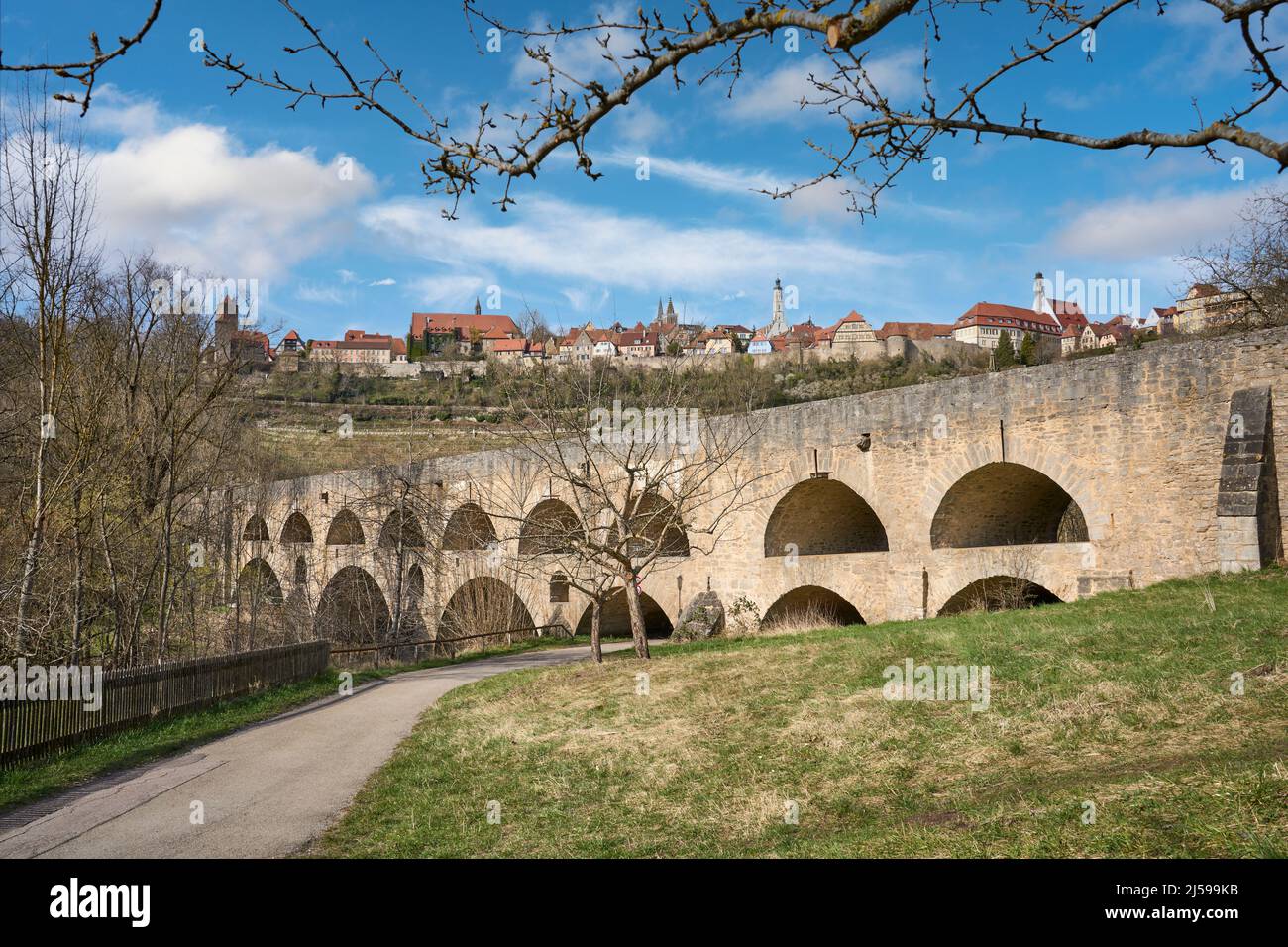 nice city woman on a cycling tour on the famous German route of castles ...