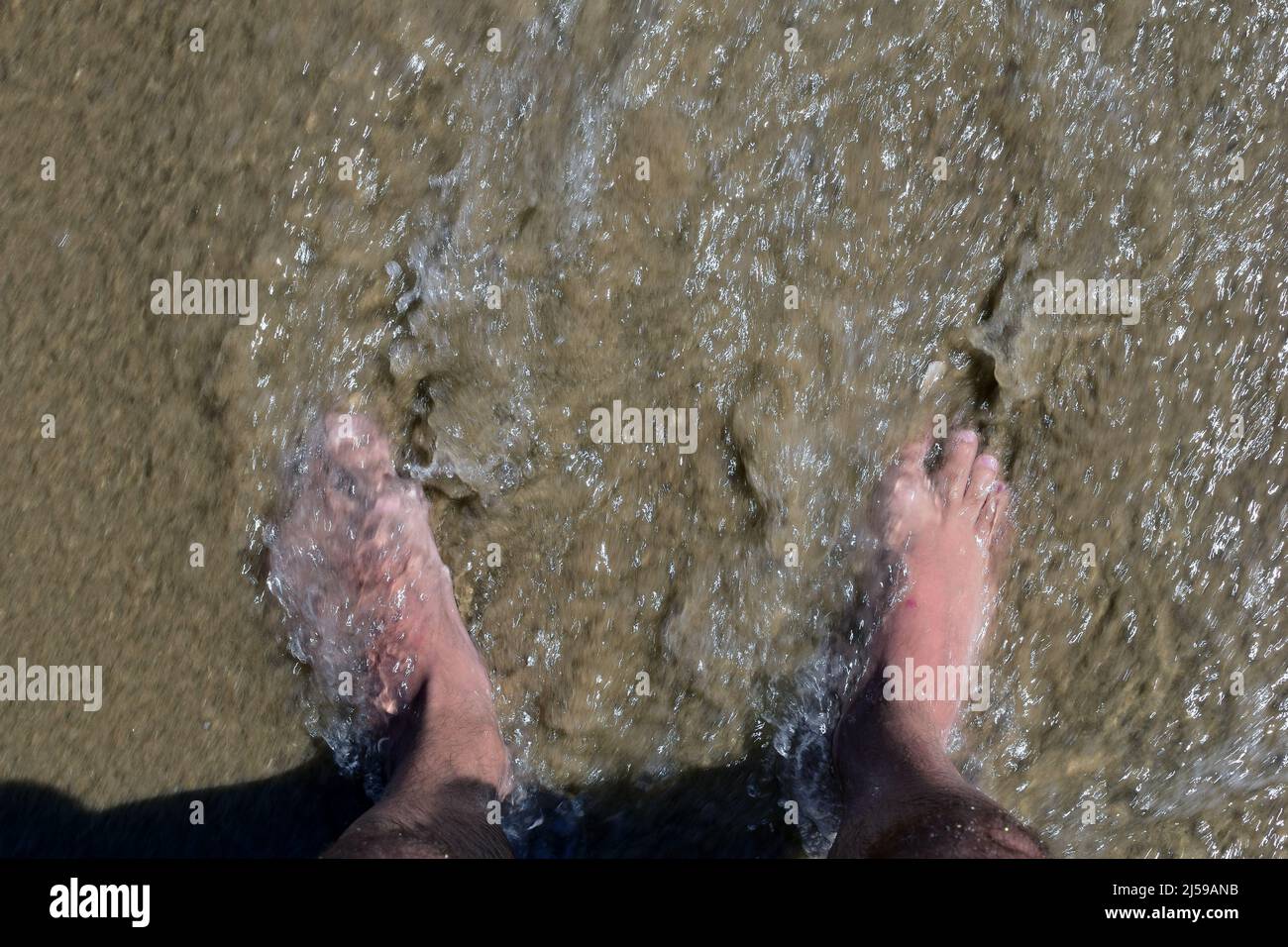 Wet human foot hi-res stock photography and images - Alamy