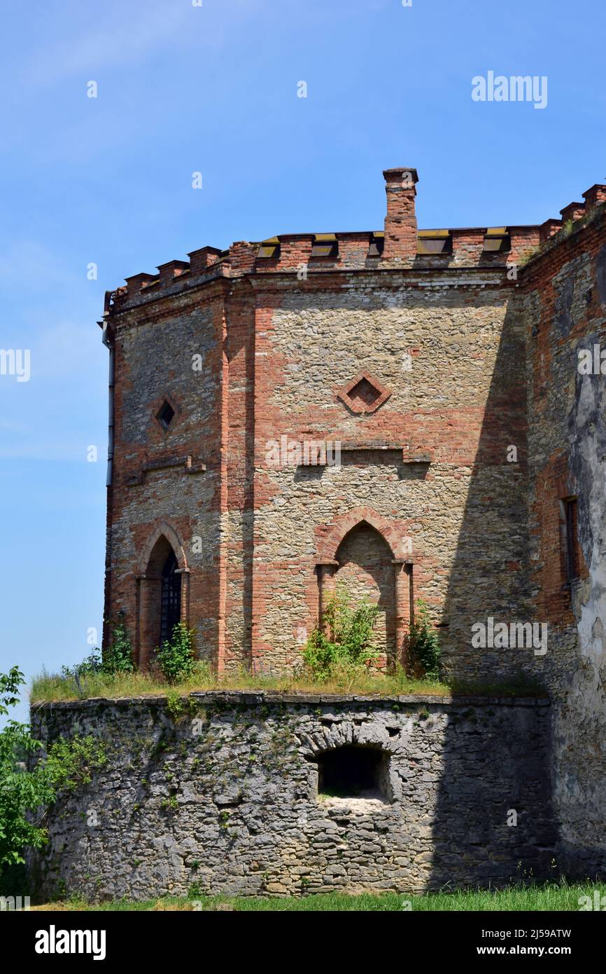 Medieval brick citadel in several tiers with loopholes and battlements ...