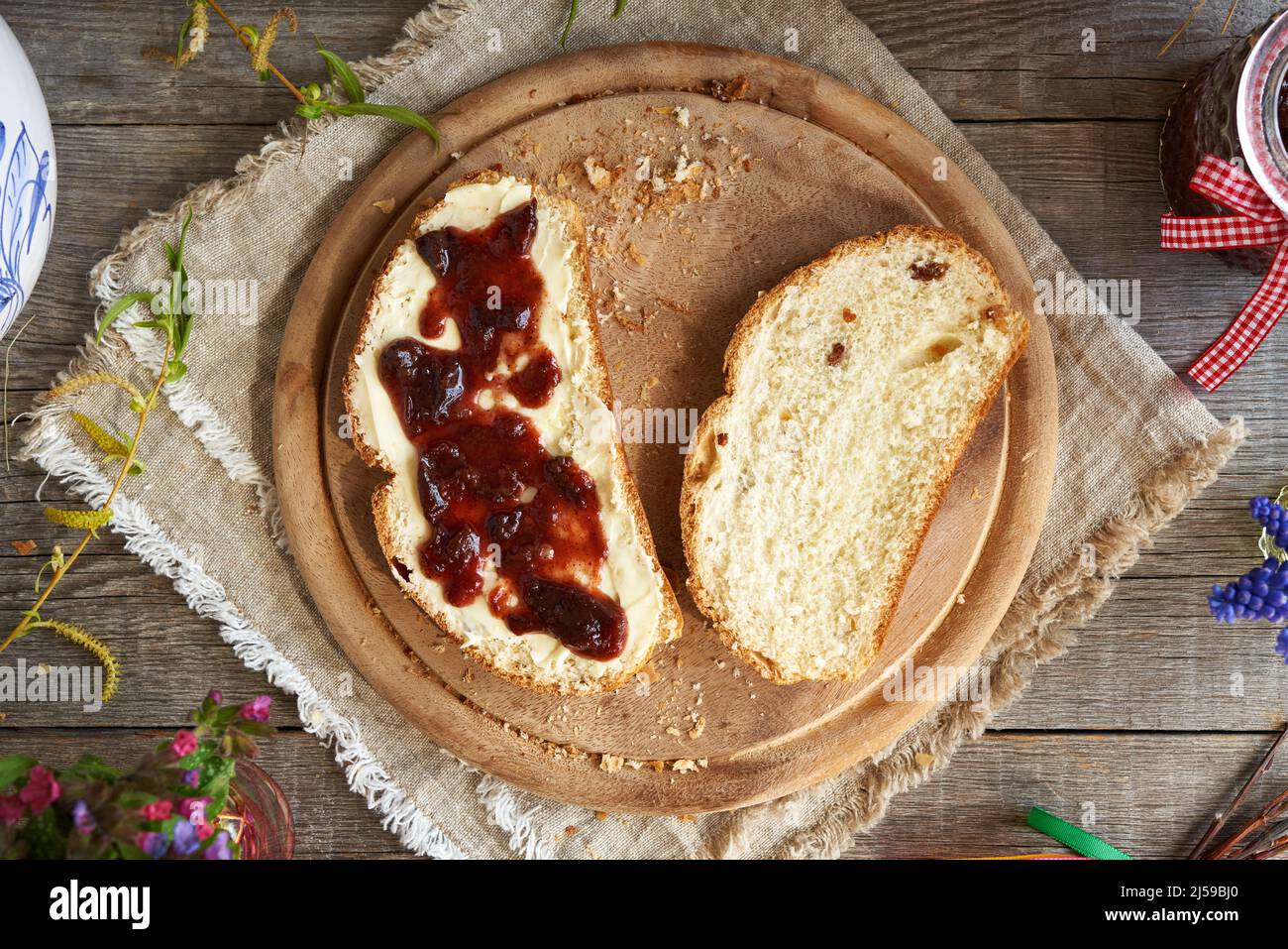 Slices of mazanec - Czech sweet Easter pastry, with butter and ...