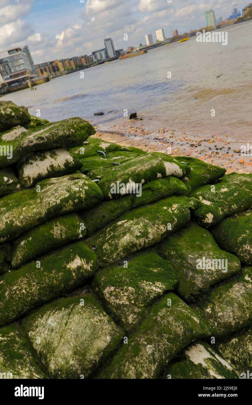 View across the Thames river in London from the Greenwich waterfront ...