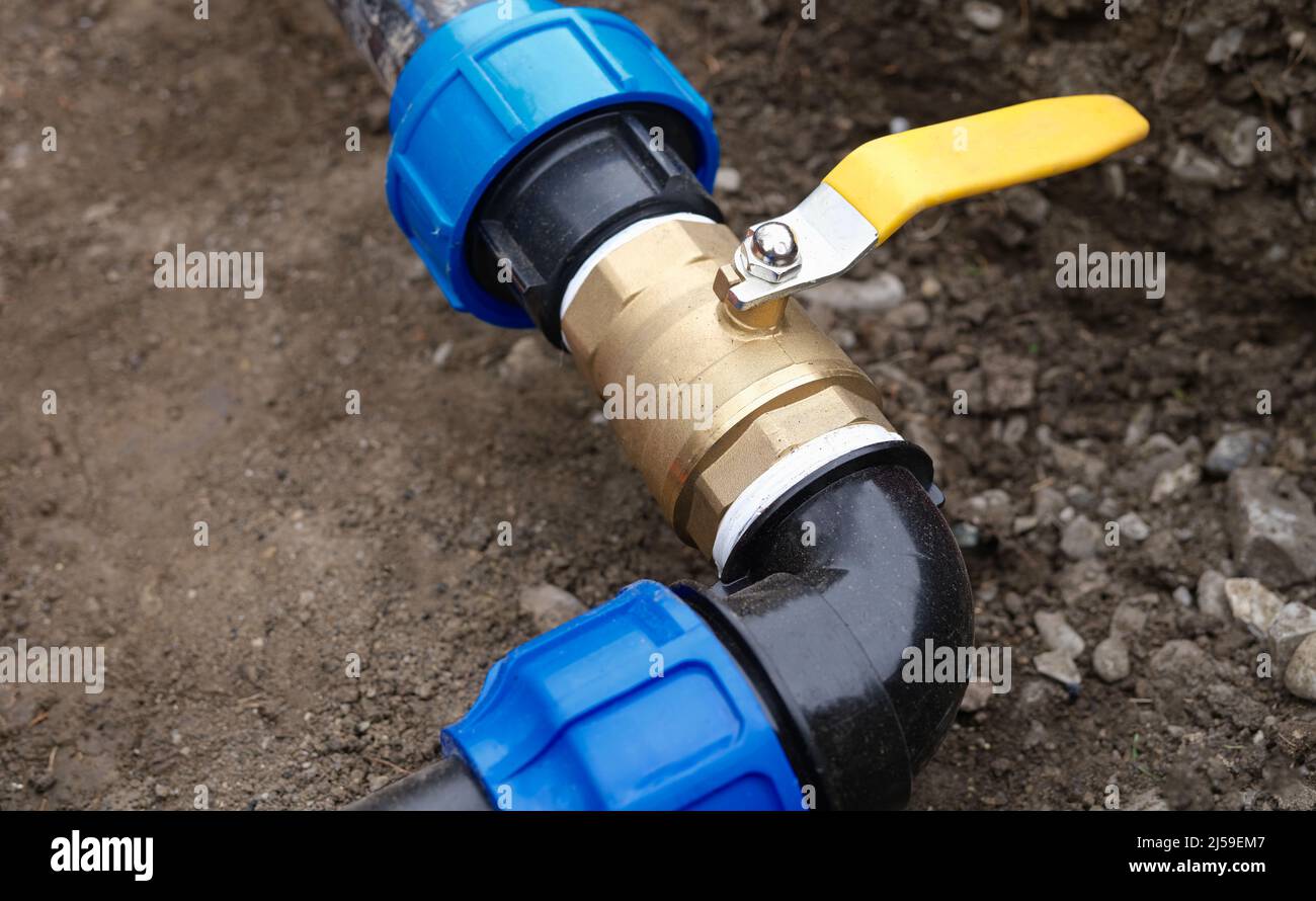 Drainage system with connector and faucet for watering garden closeup ...