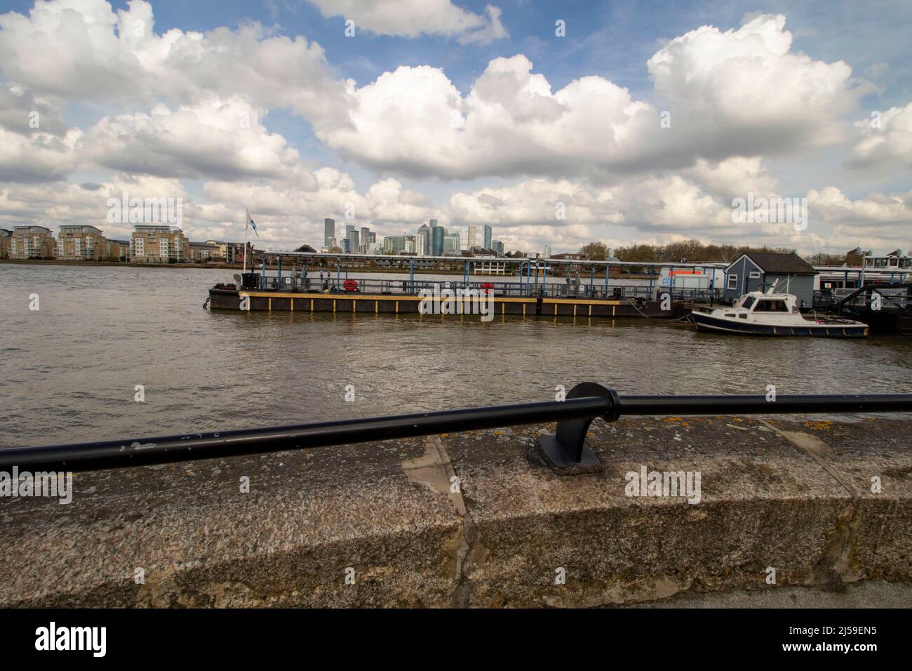 View across the Thames river in London from the Greenwich waterfront ...