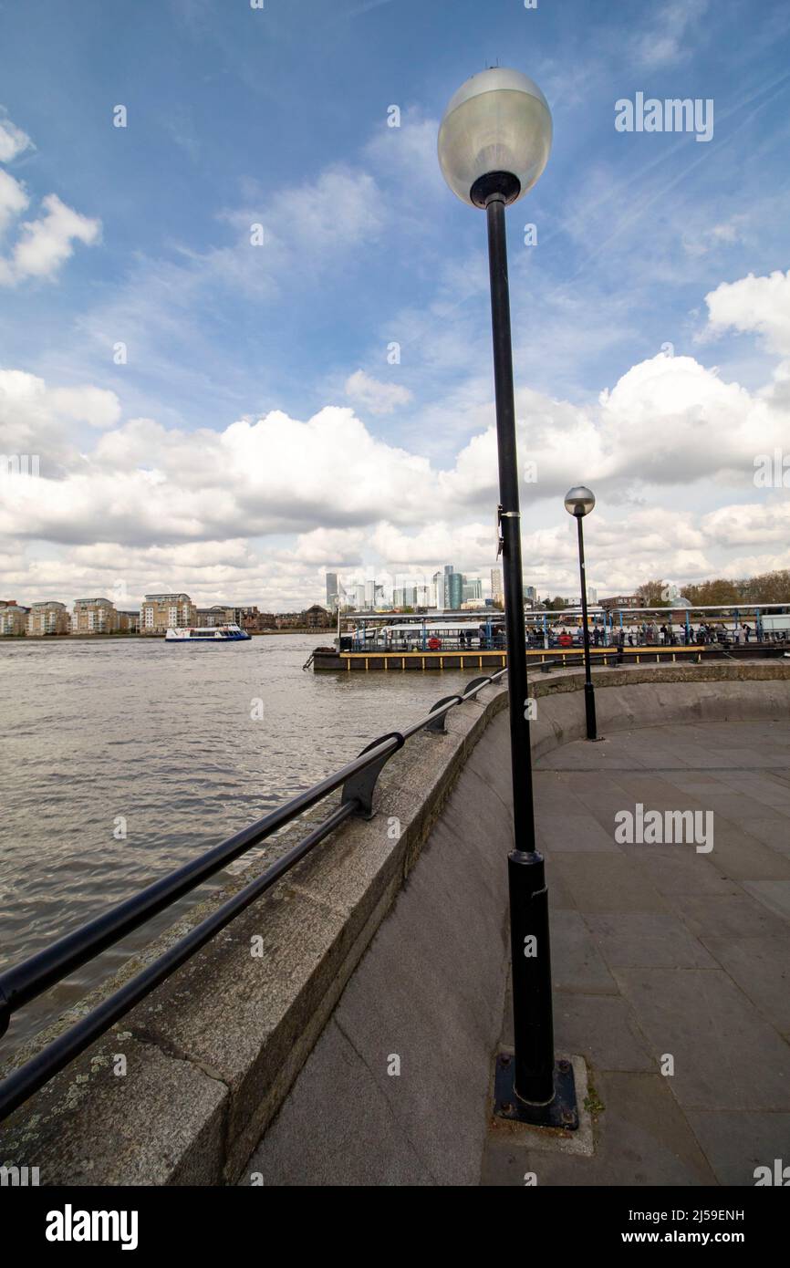 View across the Thames river in London from the Greenwich waterfront ...
