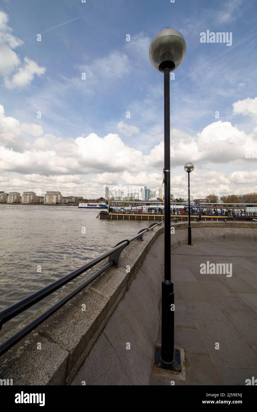 View across the Thames river in London from the Greenwich waterfront ...