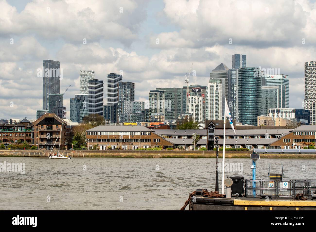 View across the Thames river in London from the Greenwich waterfront ...