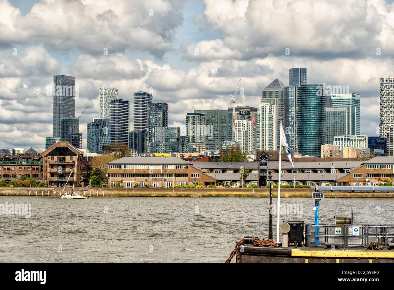 View across the Thames river in London from the Greenwich waterfront ...
