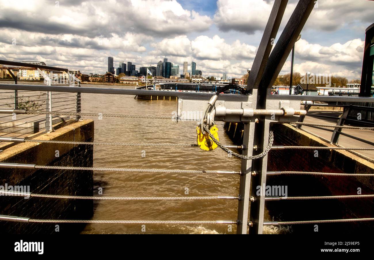 View across the Thames river in London from the Greenwich waterfront ...
