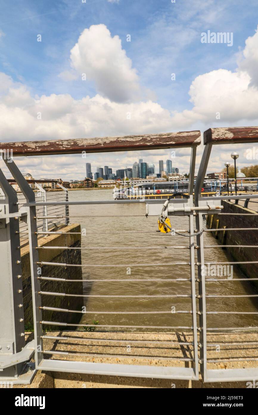 View across the Thames river in London from the Greenwich waterfront ...
