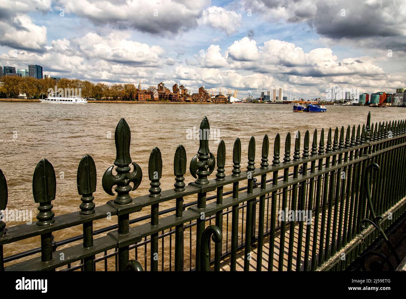 View across the Thames river in London from the Greenwich waterfront ...