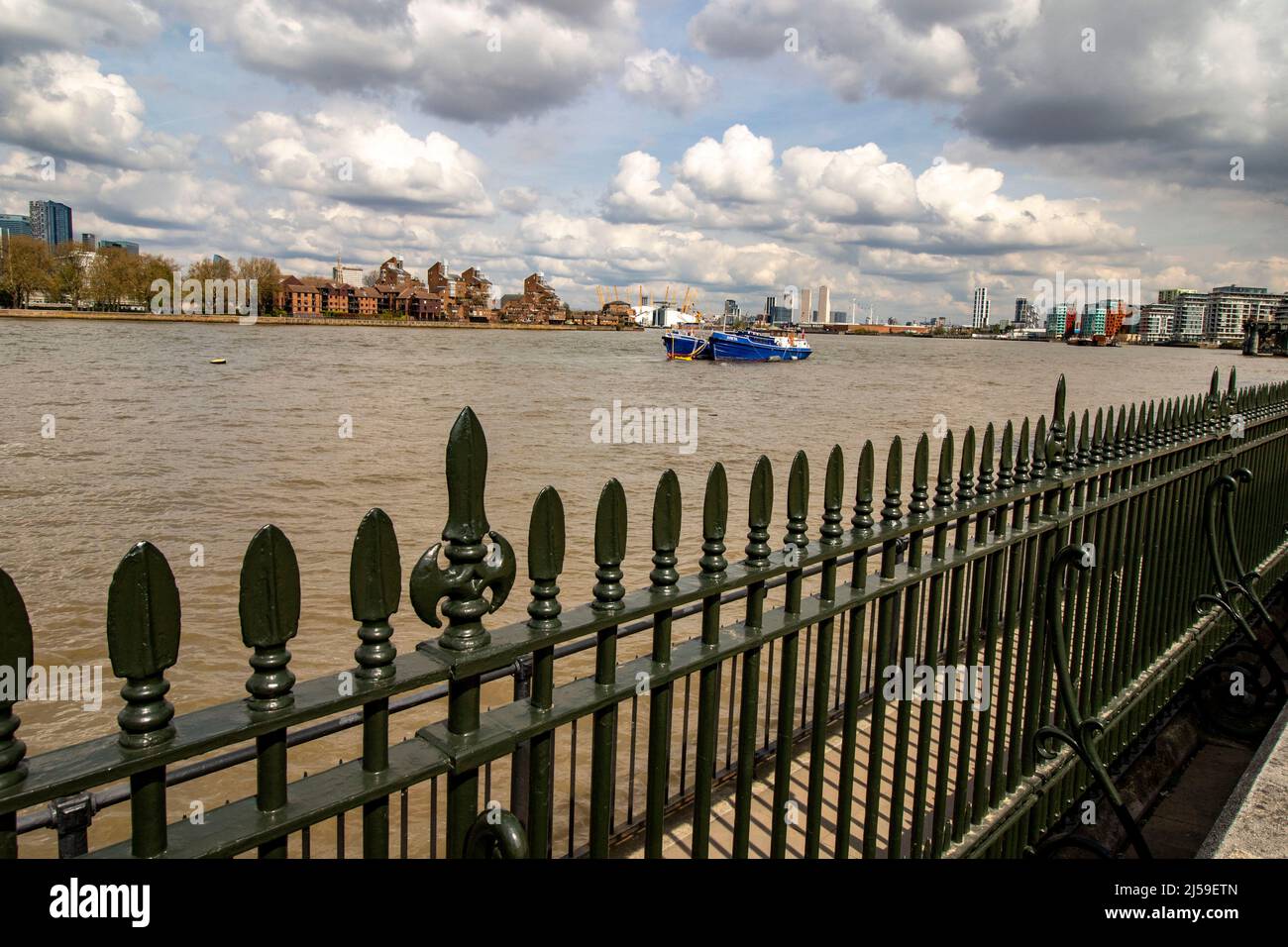 View across the Thames river in London from the Greenwich waterfront ...