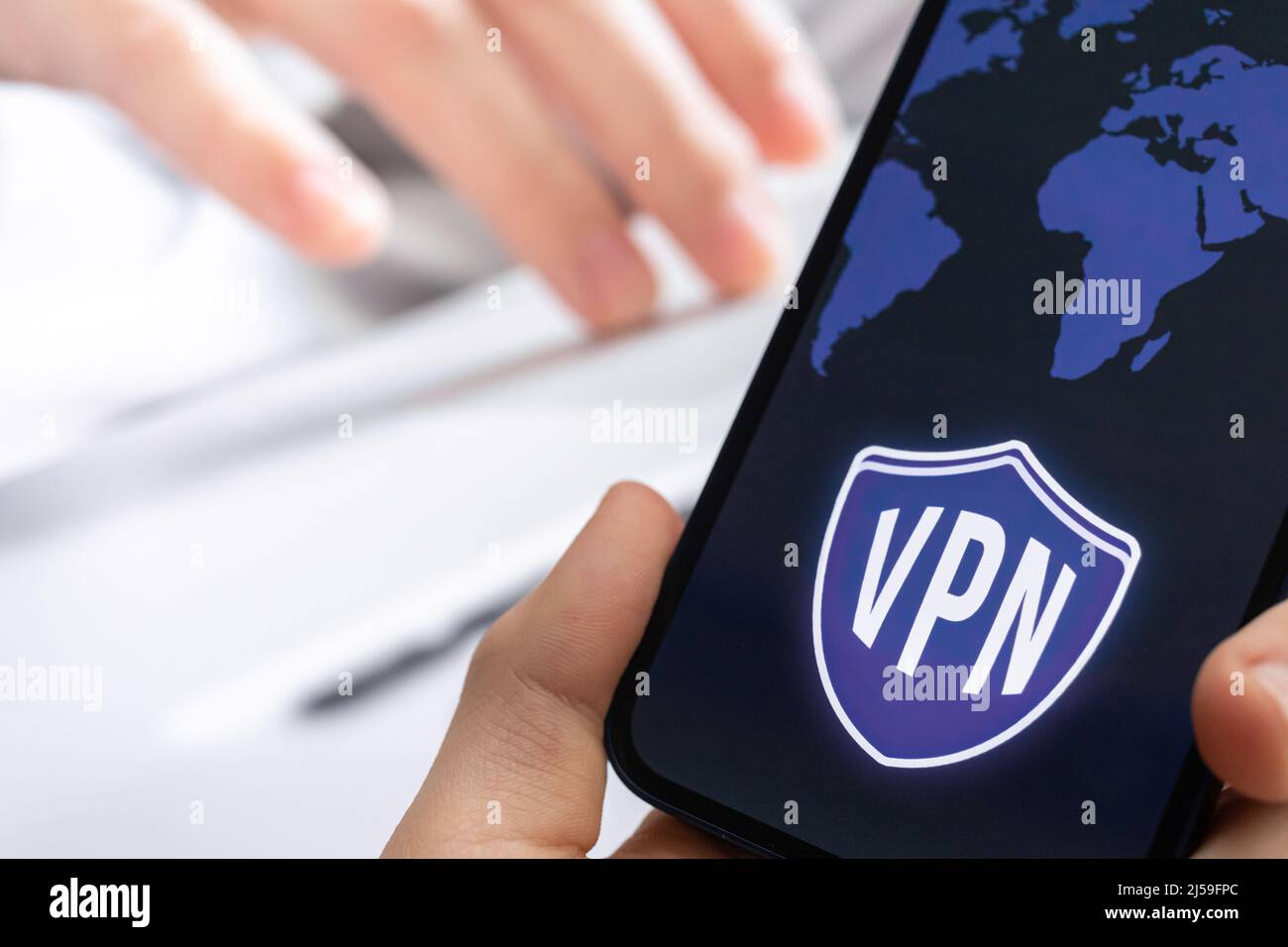 Person uses VPN technology on mobile phone. Anonymous and secure ...