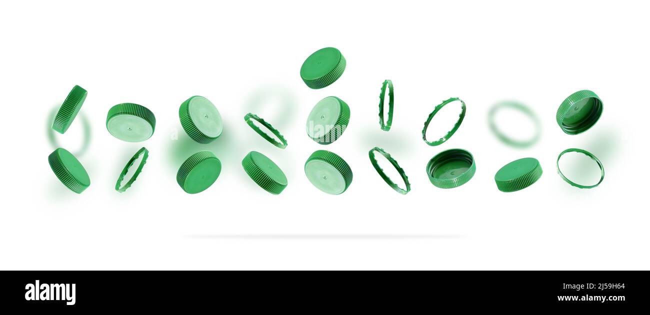 Green bottle caps for recycling on a white background. Plastic caps ...