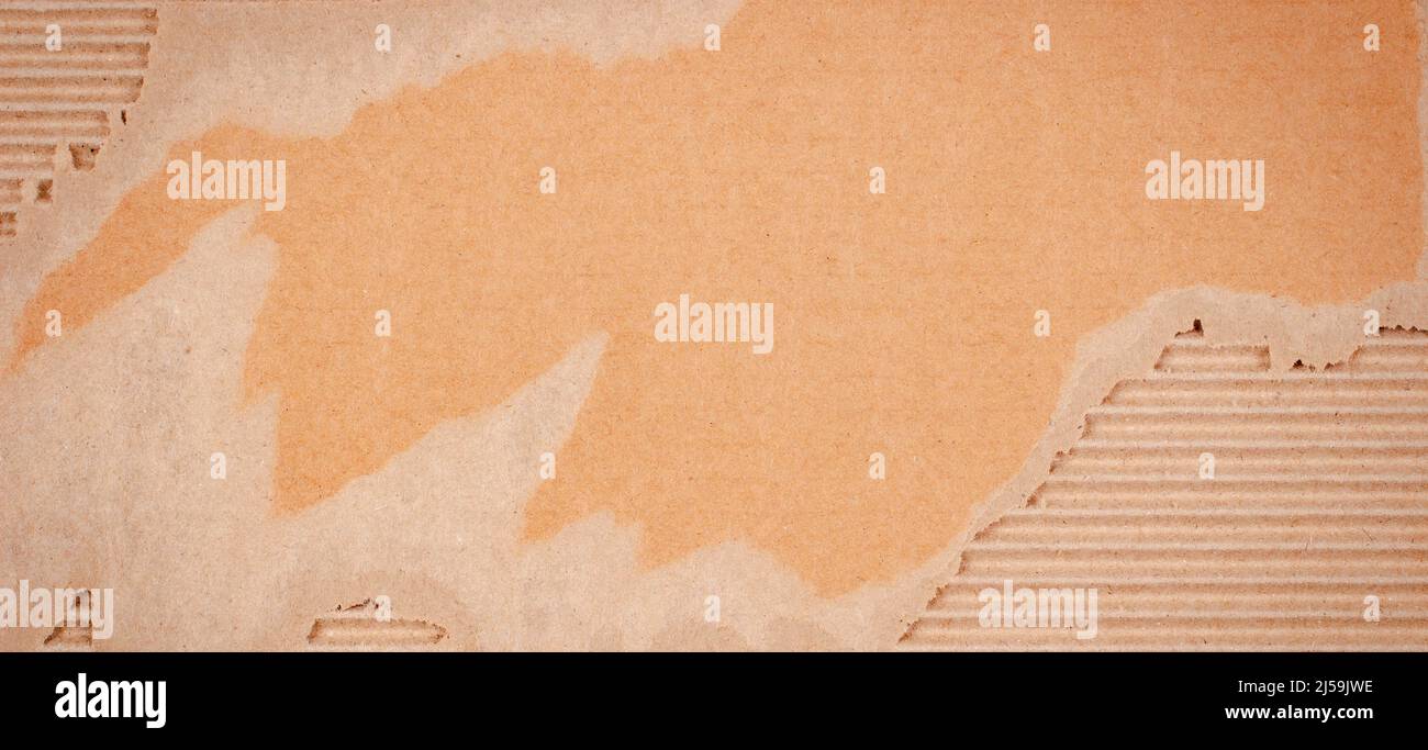 Brown corrugated cardboard with torn edges. Cardboard packaging mesh ...