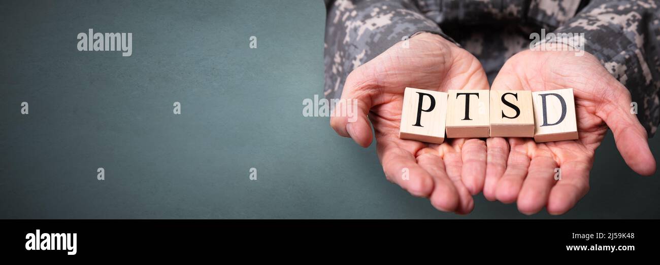Close-up Of Male Soldier In Military Uniform Holding Wooden Cubes With ...