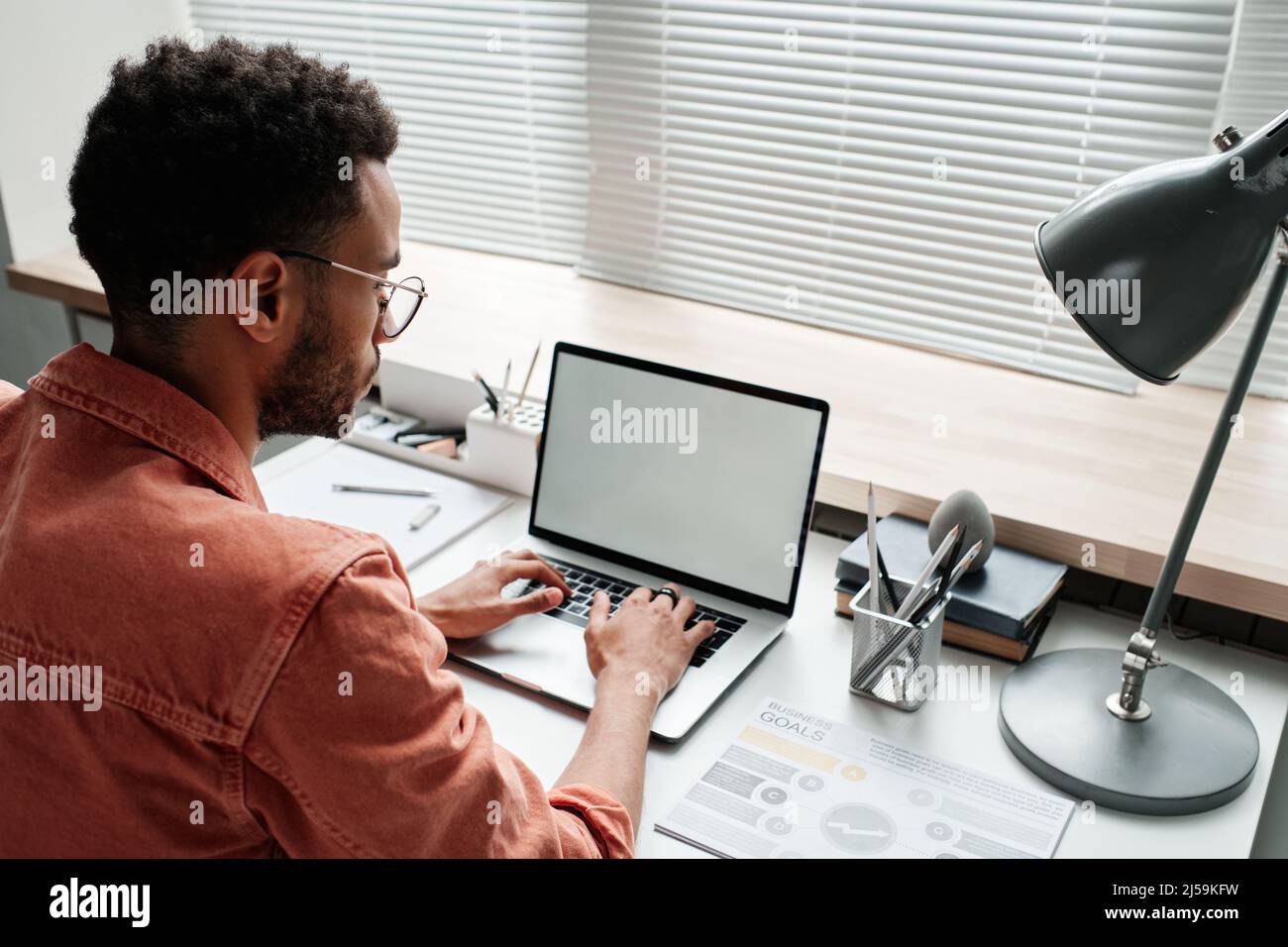 Manager looking over shoulder hi-res stock photography and images - Alamy