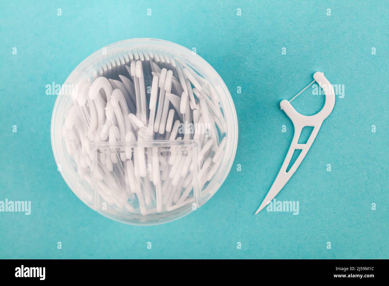 Blue container dental floss hi-res stock photography and images - Alamy