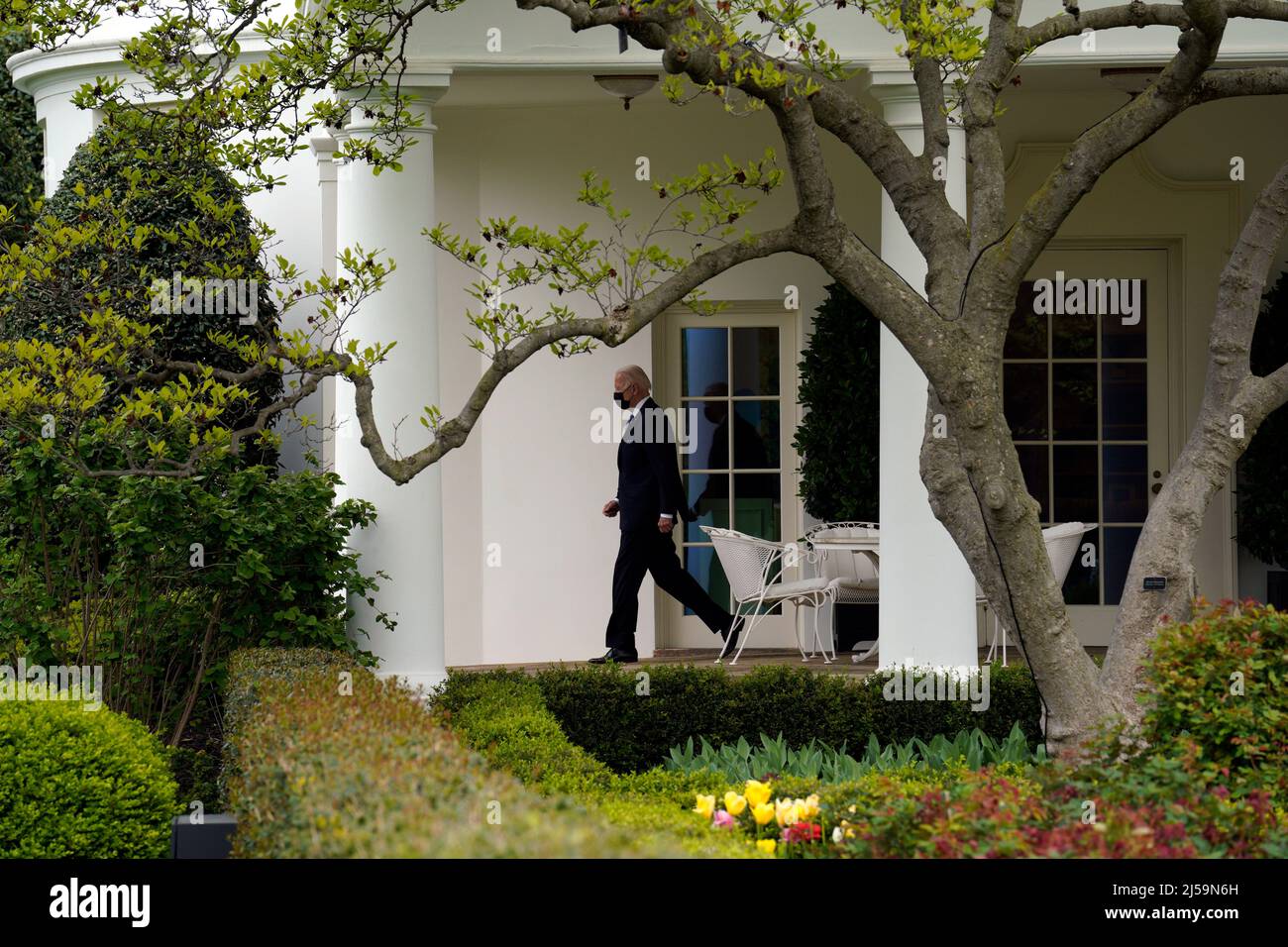 United States President Joe Biden walks from the Oval Office of the ...