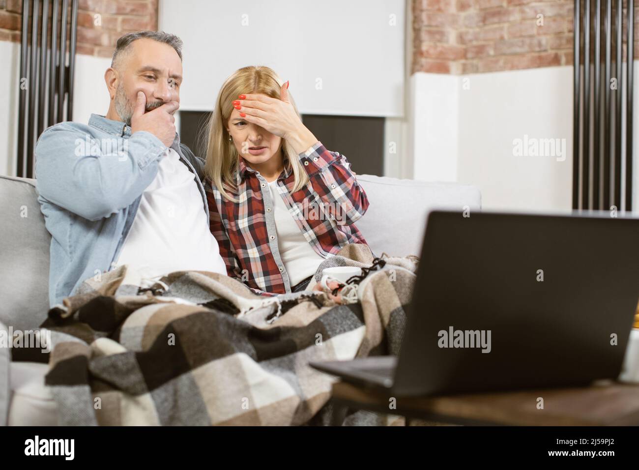 Scared married couple using hi-res stock photography and images - Alamy