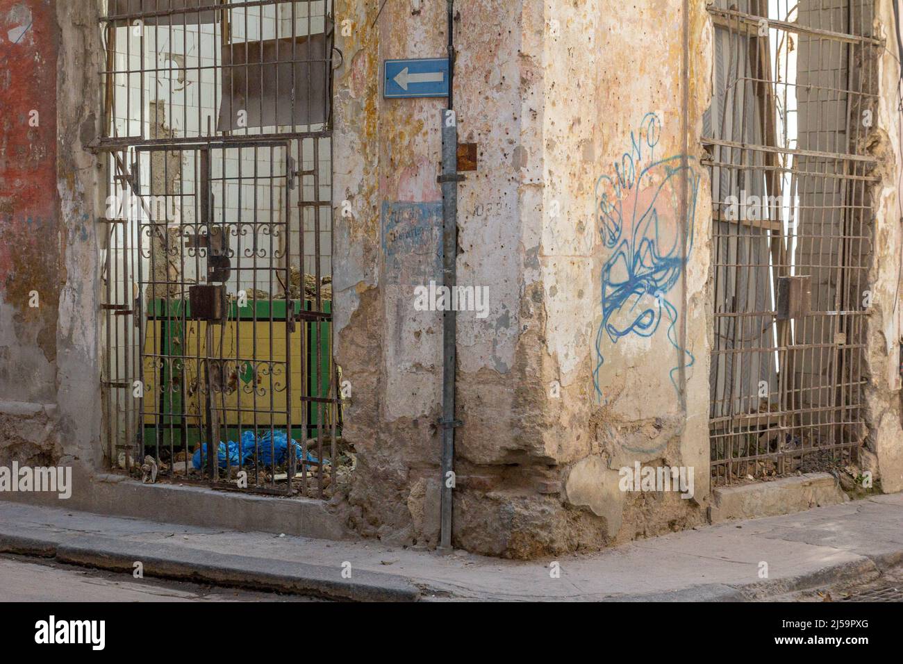 Weathered and run-down walls of an abandoned building located in a city ...