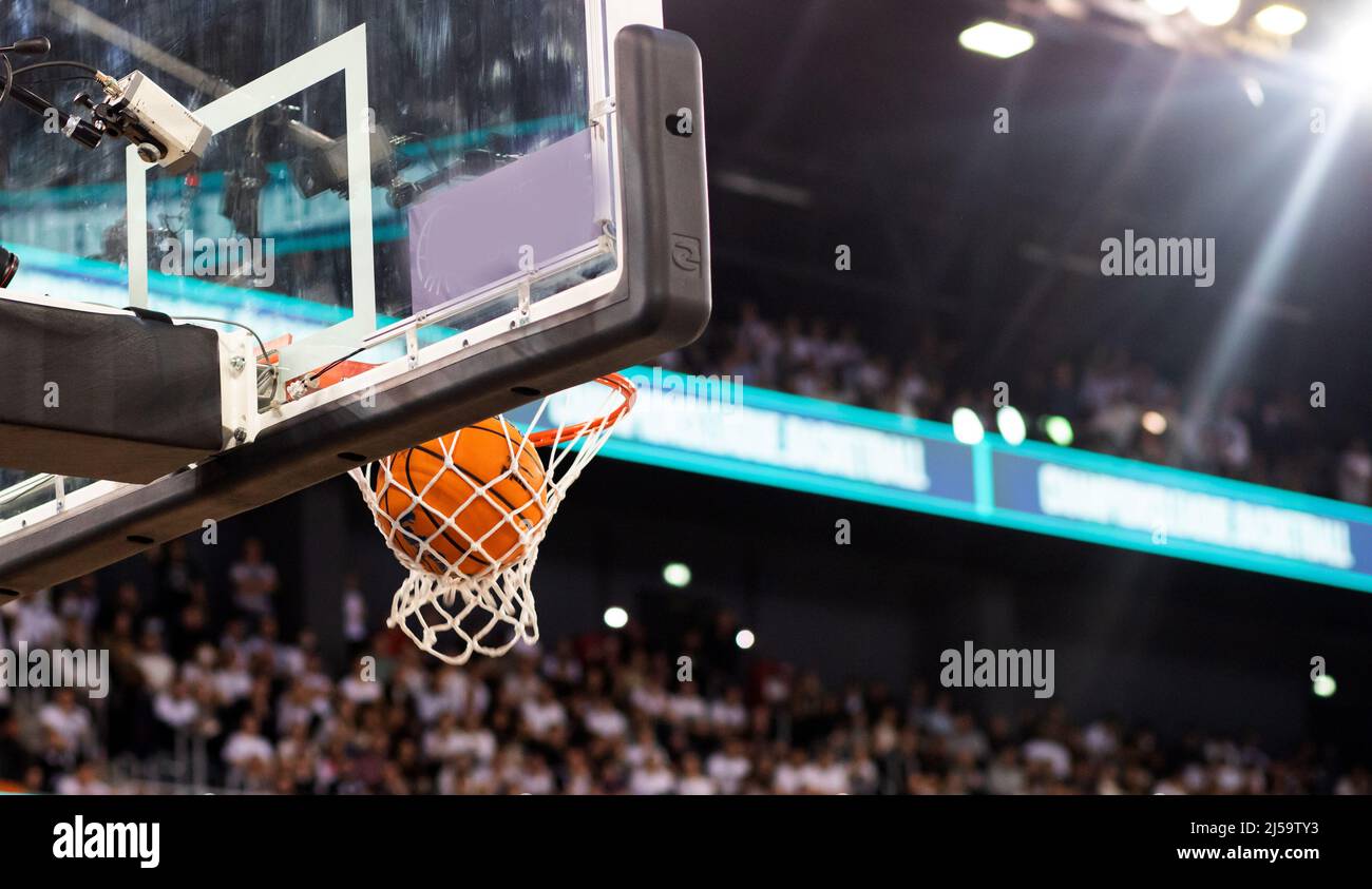 basketball game ball in hoop Stock Photo - Alamy