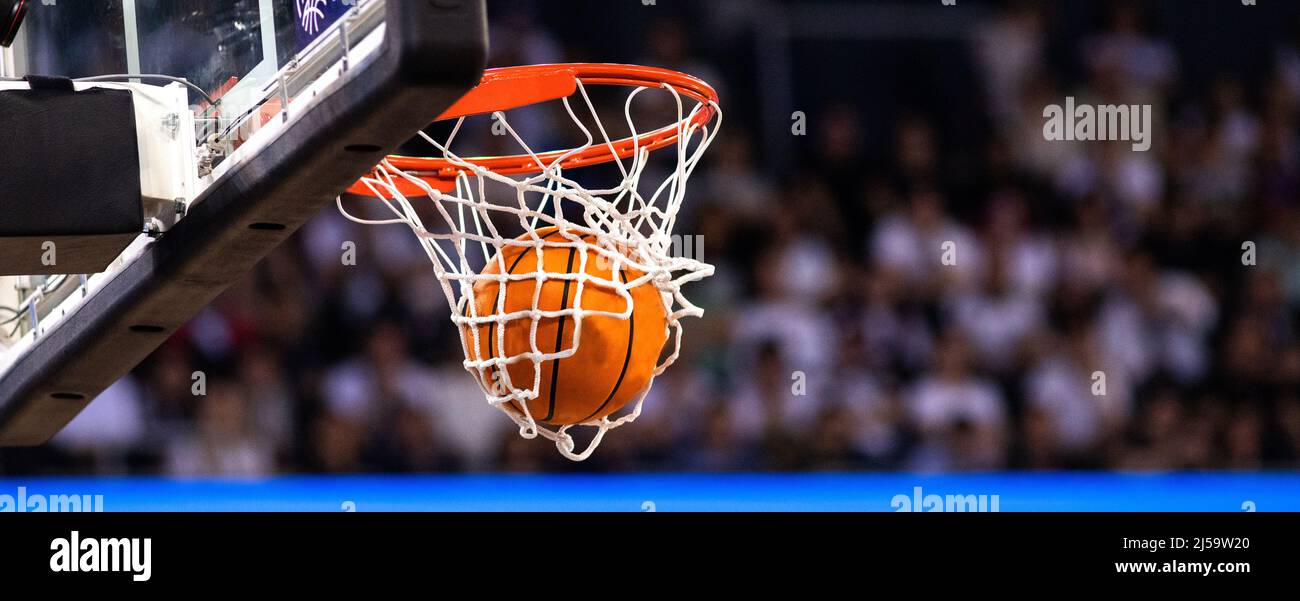 basketball game ball in hoop Stock Photo - Alamy