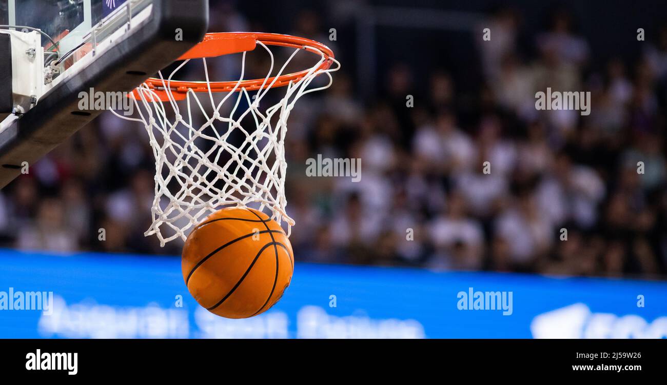 basketball game ball in hoop Stock Photo - Alamy