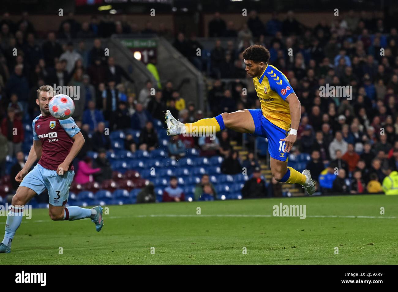 Che Adams #10 of Southampton shoots on goal, saved by Nick Pope #1 of ...
