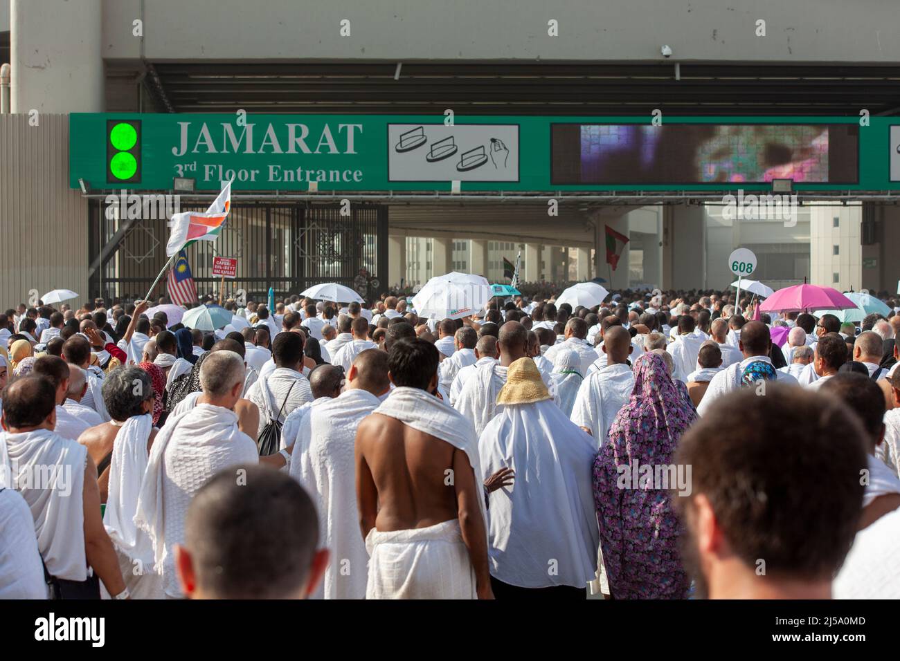 pilgrims walking towards the Jamarat ritual in Mina, Makkah, Saudi ...