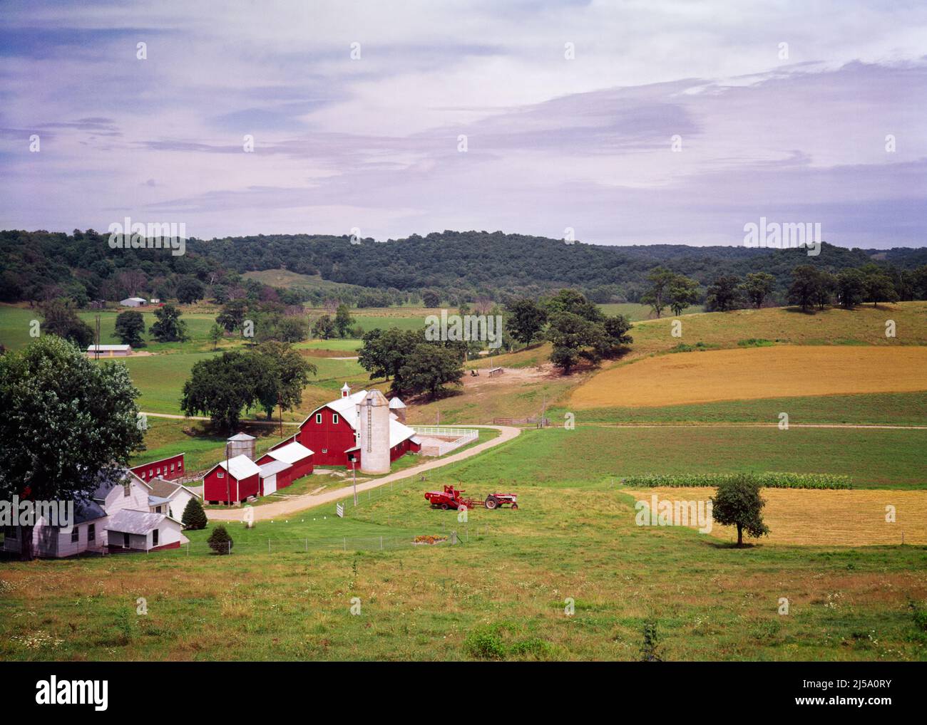1970s SCENIC VIEW OF FAMILY FARM WITH FARMHOUSE RED BARNS SILO AND ...