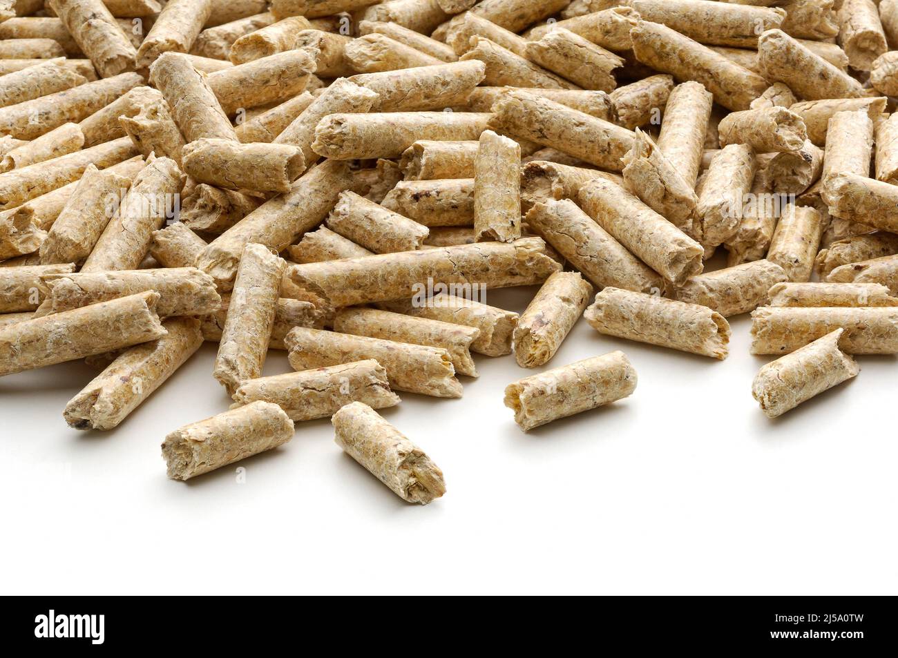 Wood pellets fuel perspective view on white background Stock Photo - Alamy