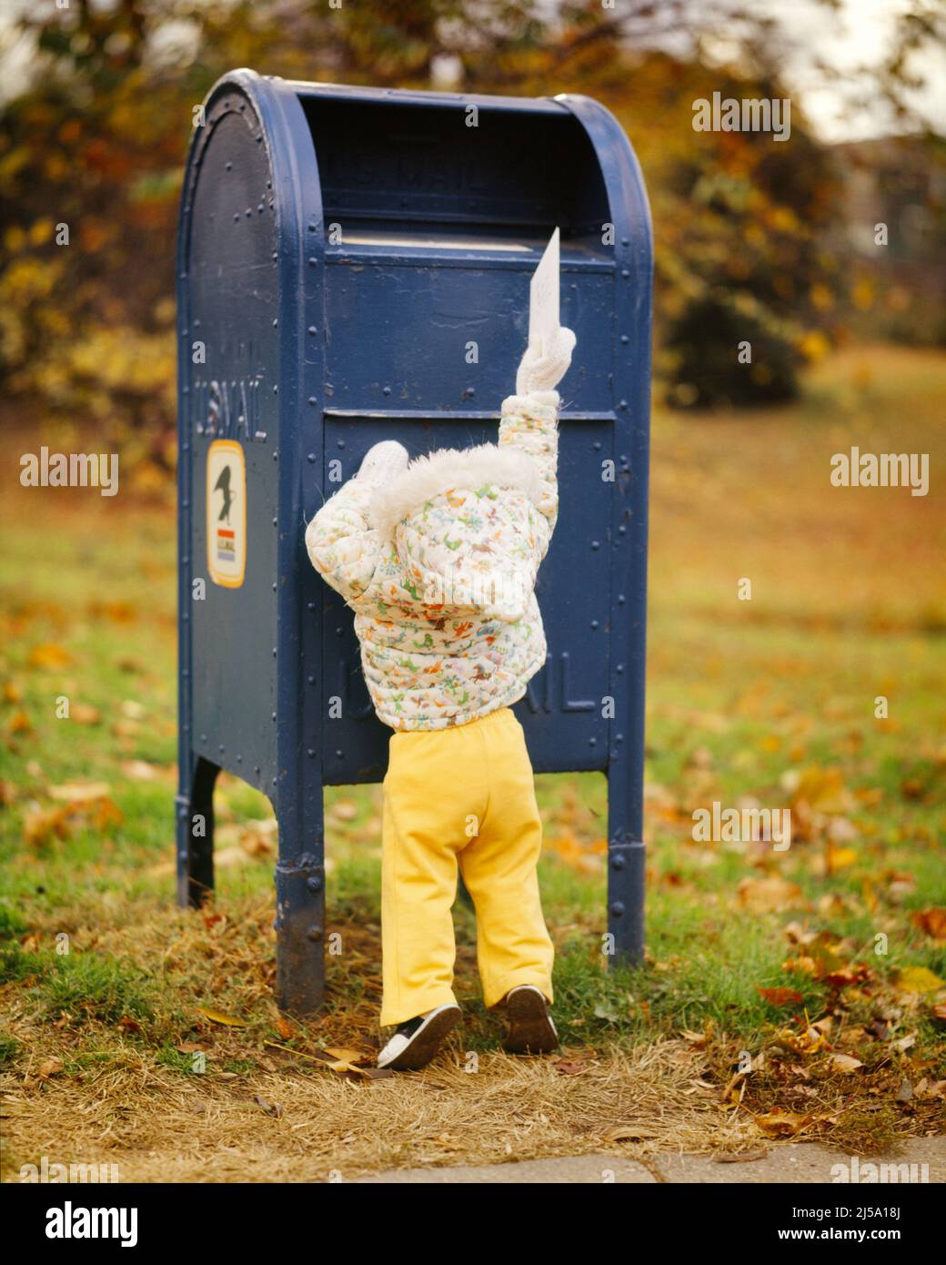 1970s LITTLE GIRL TODDLER REACHING UP TRYING TO DROP LETTER IN USPS ...