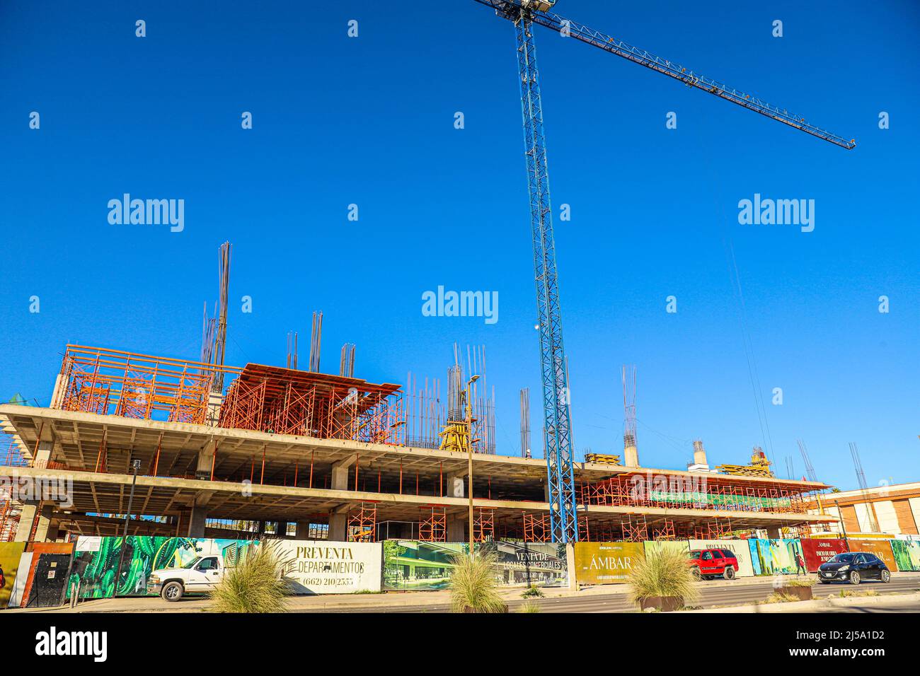 Crane and building under construction, condominiums, apartments, real ...