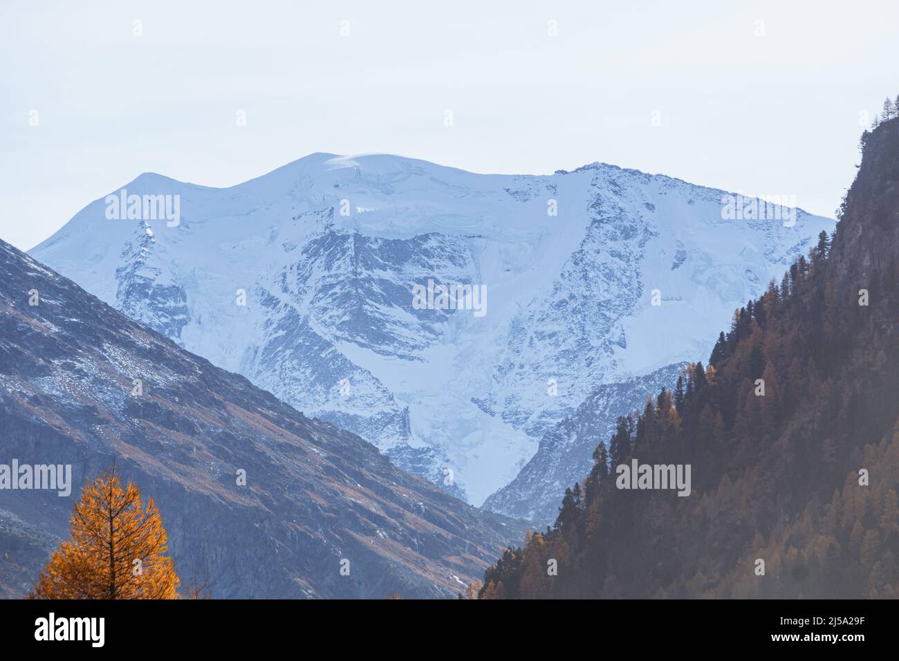 autumn in the Swiss Alps with its colors, mountains, glaciers and ...