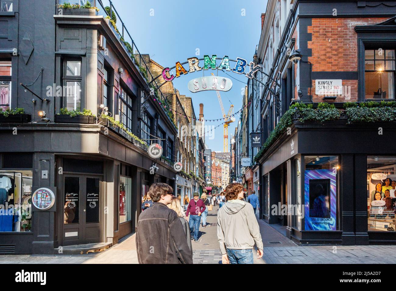 Shoppers and tourists in Foubert's Place and Kingly Street, adjacent to ...
