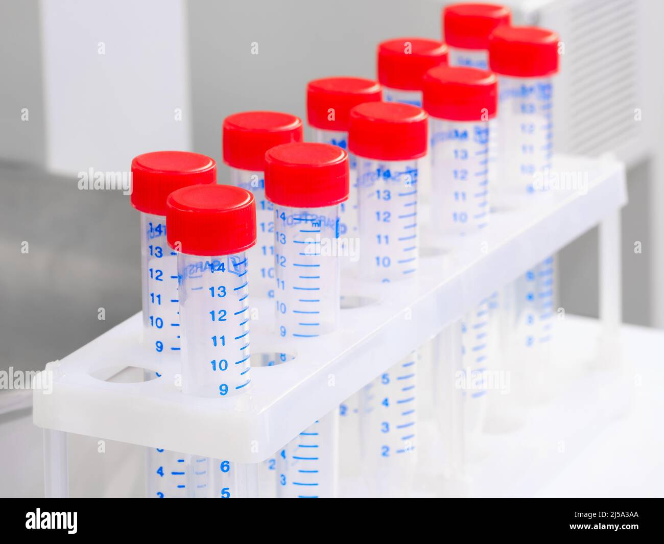 Medical or chemical background with laboratory equipment and liquids ...