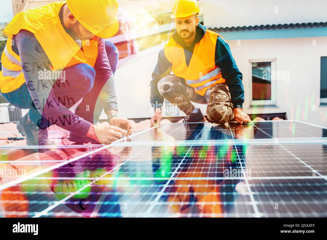 Workers assemble energy system with solar panel for electricity Stock ...