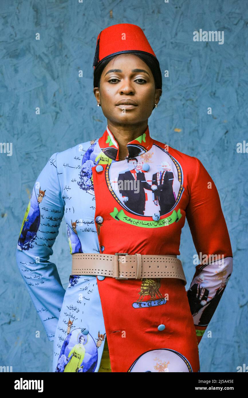 London, UK. 21st Apr, 2022. A model wears one of four colourful 'Askari ...