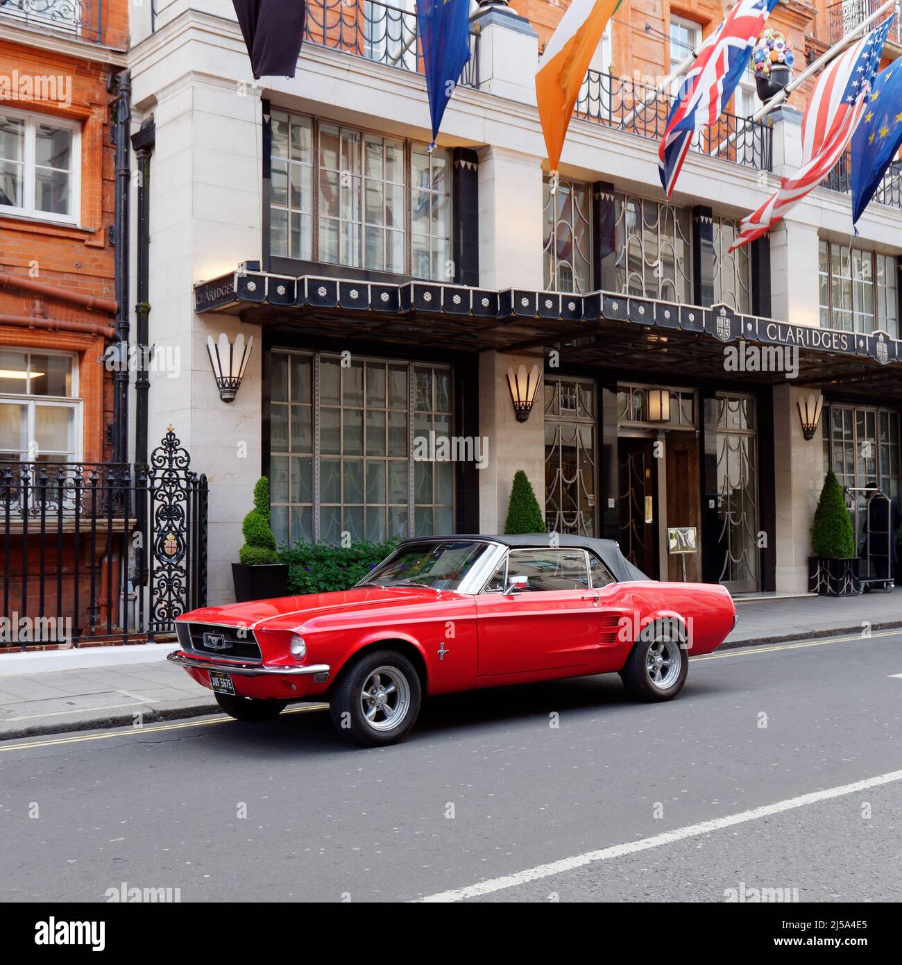 London, Greater London, England, April 09 2022: Red mustang car outside ...