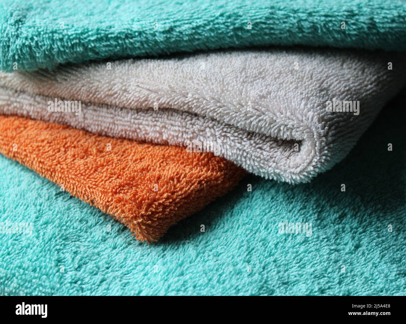 A Stack of Colorful Towels Stock Photo - Alamy