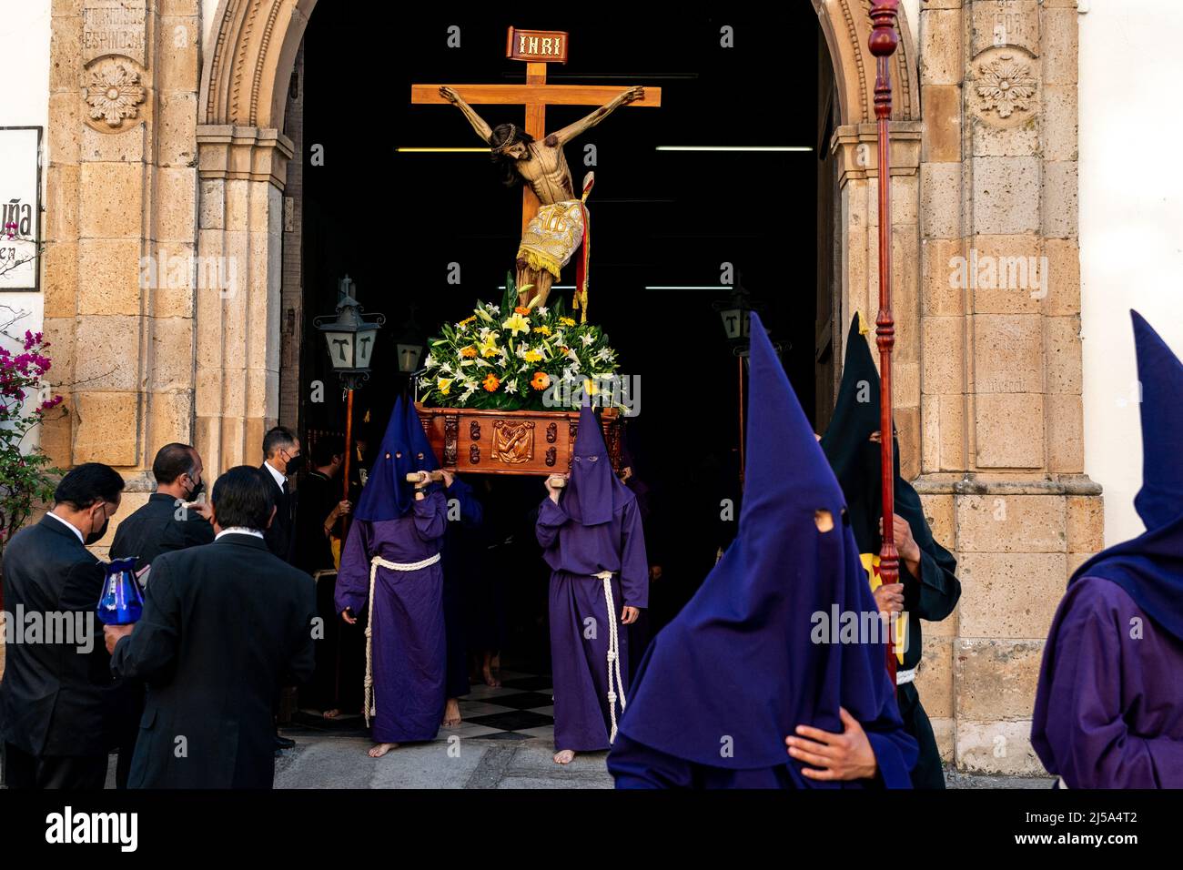 Roman Catholic hooded penitents wearing traditional capirotes, began ...