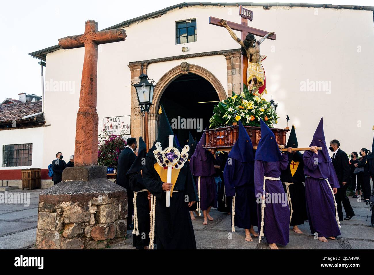 Roman Catholic hooded penitents wearing traditional capirotes, began ...