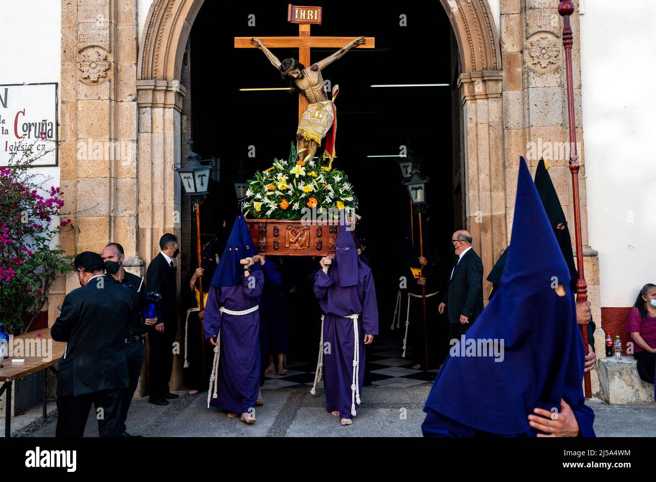 Roman Catholic hooded penitents wearing traditional capirotes, began ...