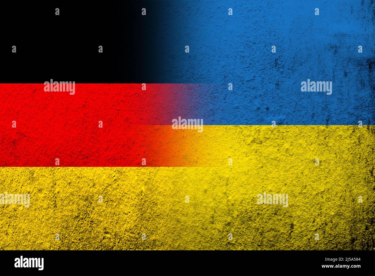 The national flag of Germany with National flag of Ukraine. Grunge ...