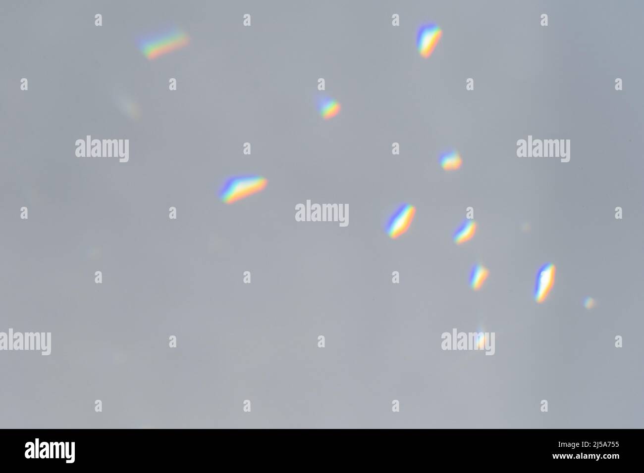 .Abstract prism reflection, rays leaking through lens effect. Crystal ...