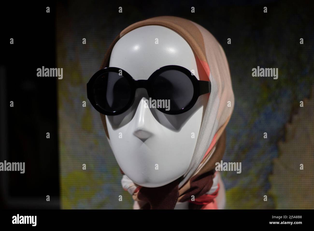 Mannequin with glasses. Figure of man. Window of clothing store. Man's ...