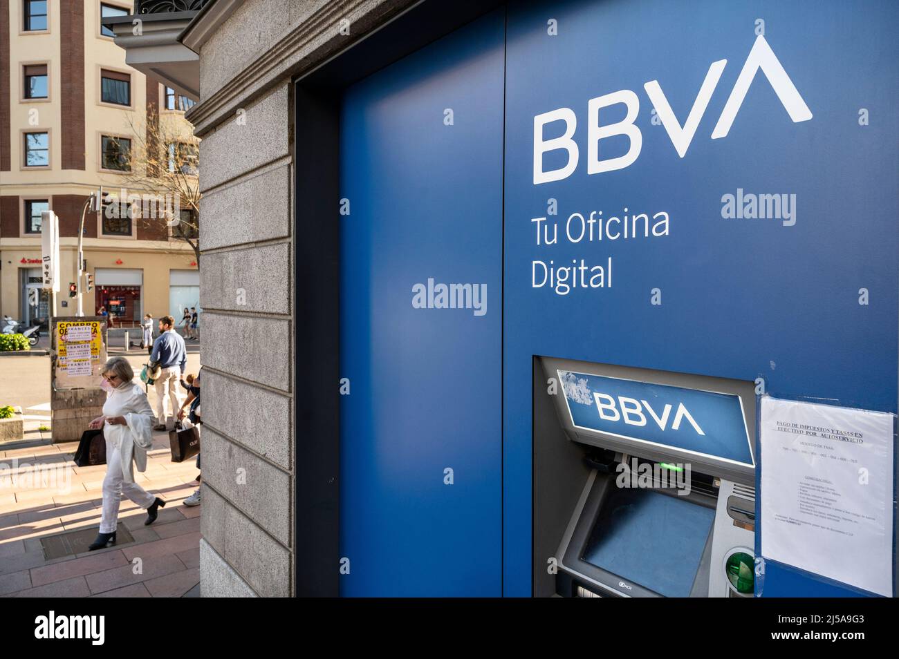 An ATM machine at the Spanish multinational BBVA bank in Spain. (Photo ...